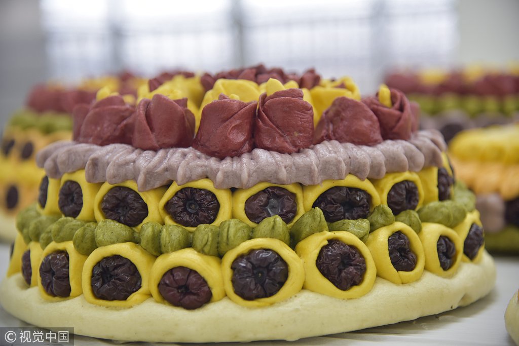 Decorated steamed buns welcome Chinese New Year - China Plus