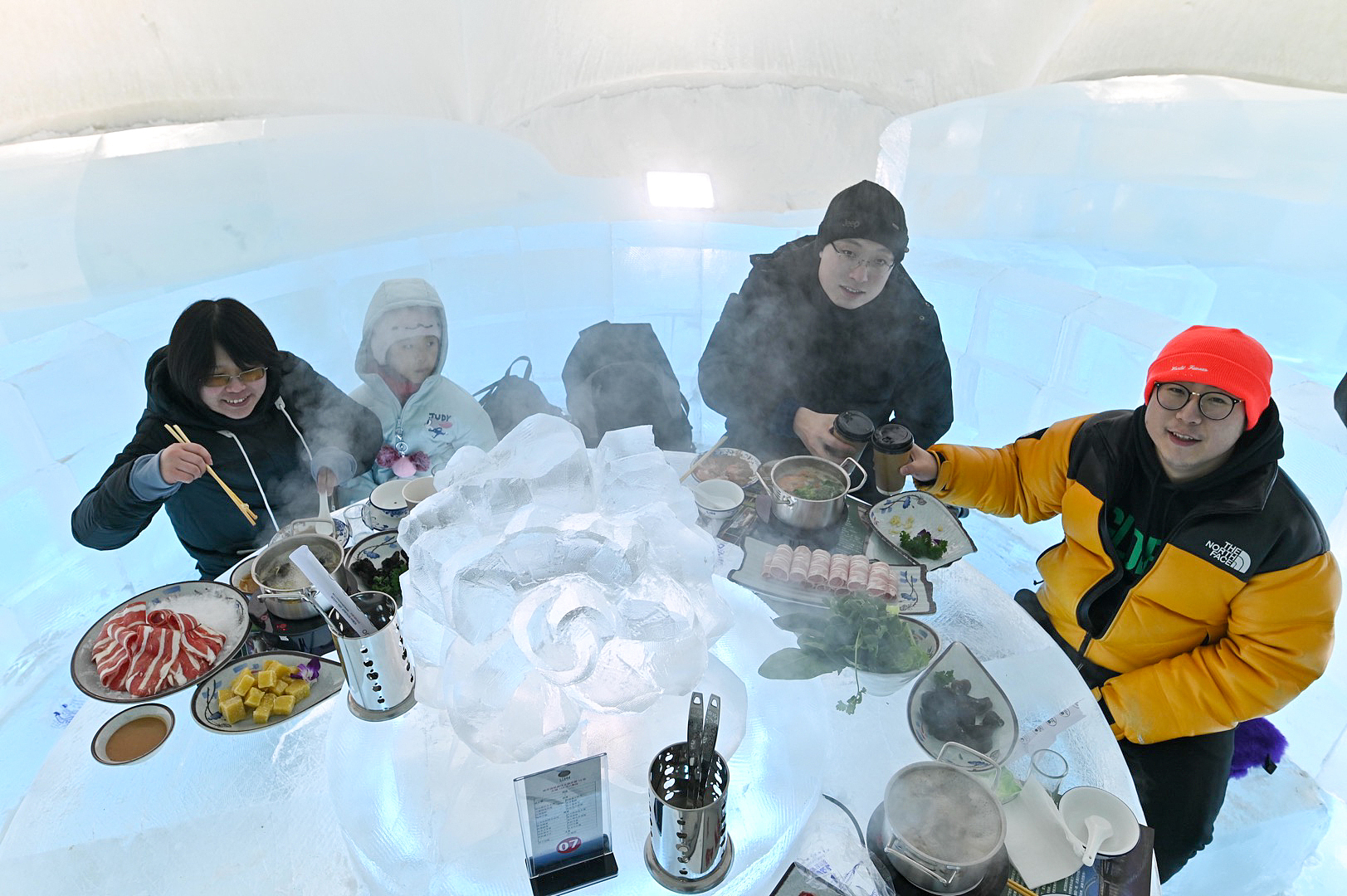 Hotpot in ice hut gains popularity in northeast China's Harbin - China Plus