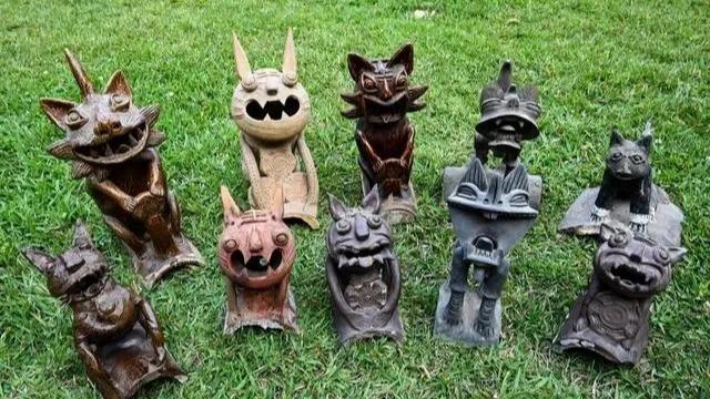 Maskotka umieszczana na dachach w prowincji Yunnan - kot Wamao